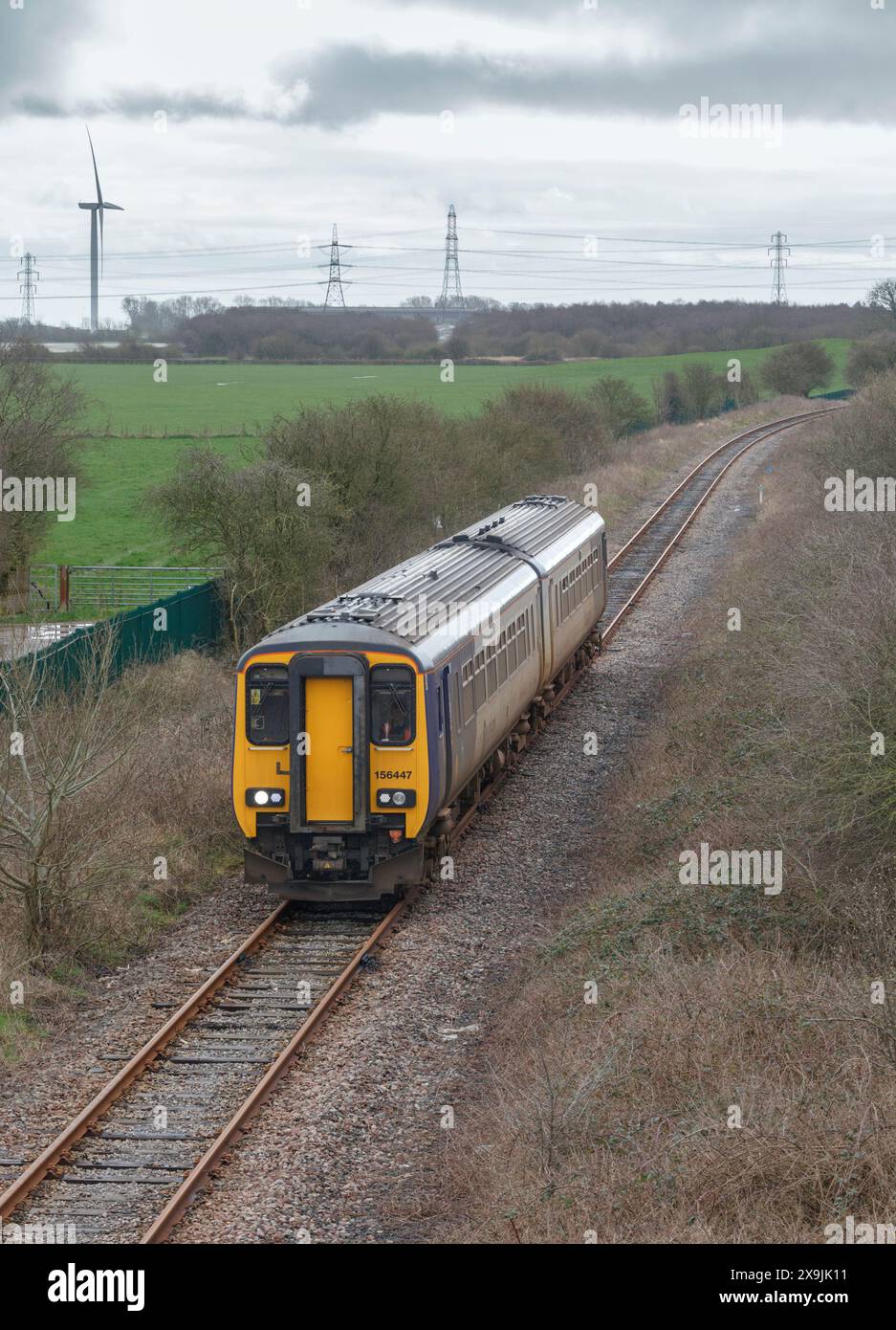 Northern Rail class 156 diesel train on the single track Heysham branch line with the one daily ...