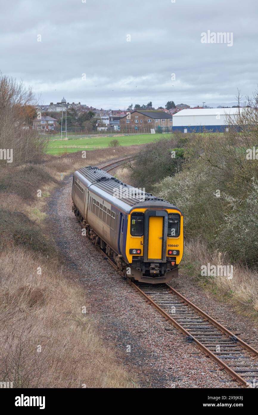 Northern Rail class 156 diesel train on the single track Heysham branch line with the one daily ...
