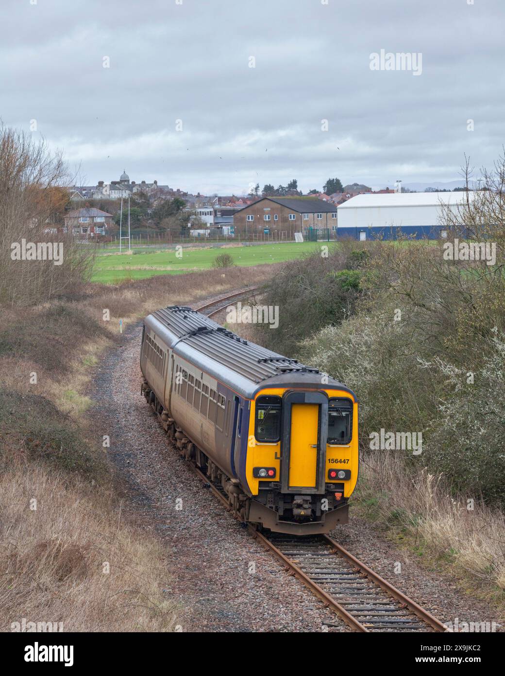 Northern Rail class 156 diesel train on the single track Heysham branch ...