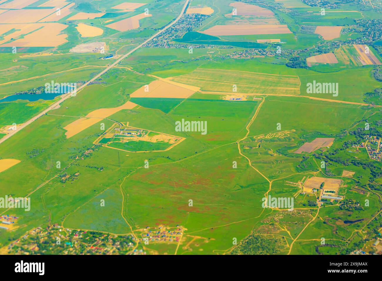 Beautiful view from the airplane window to the flowering fields of ...