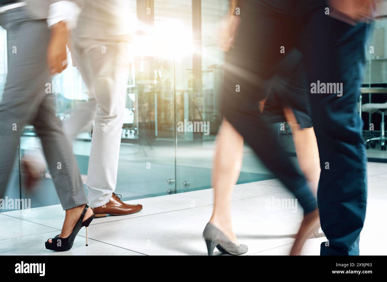 Office, motion blur and legs of people for walking, movement and ...