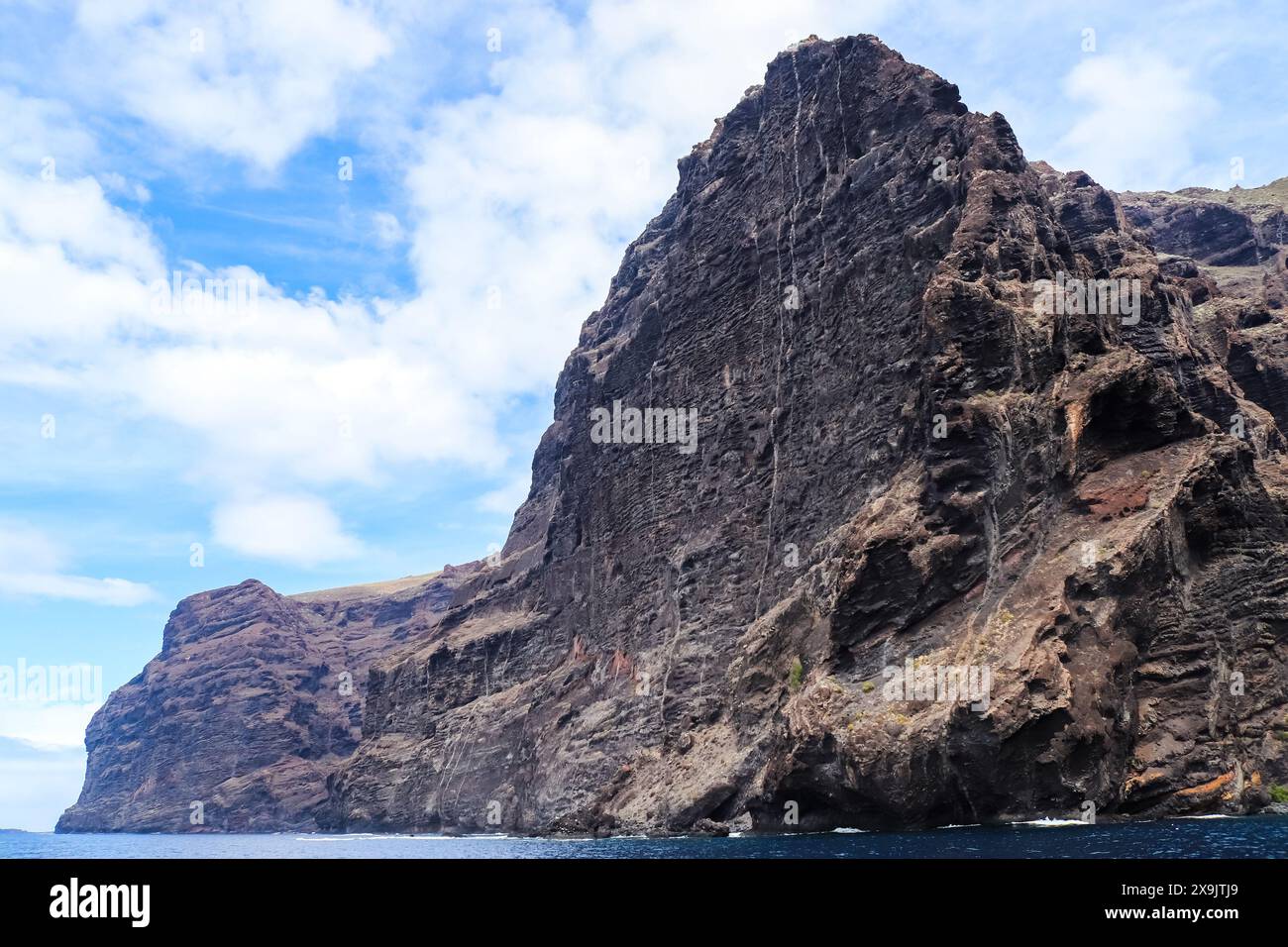 View of the mighty cliffs of Los Gigantes on Tenerife from the water ...