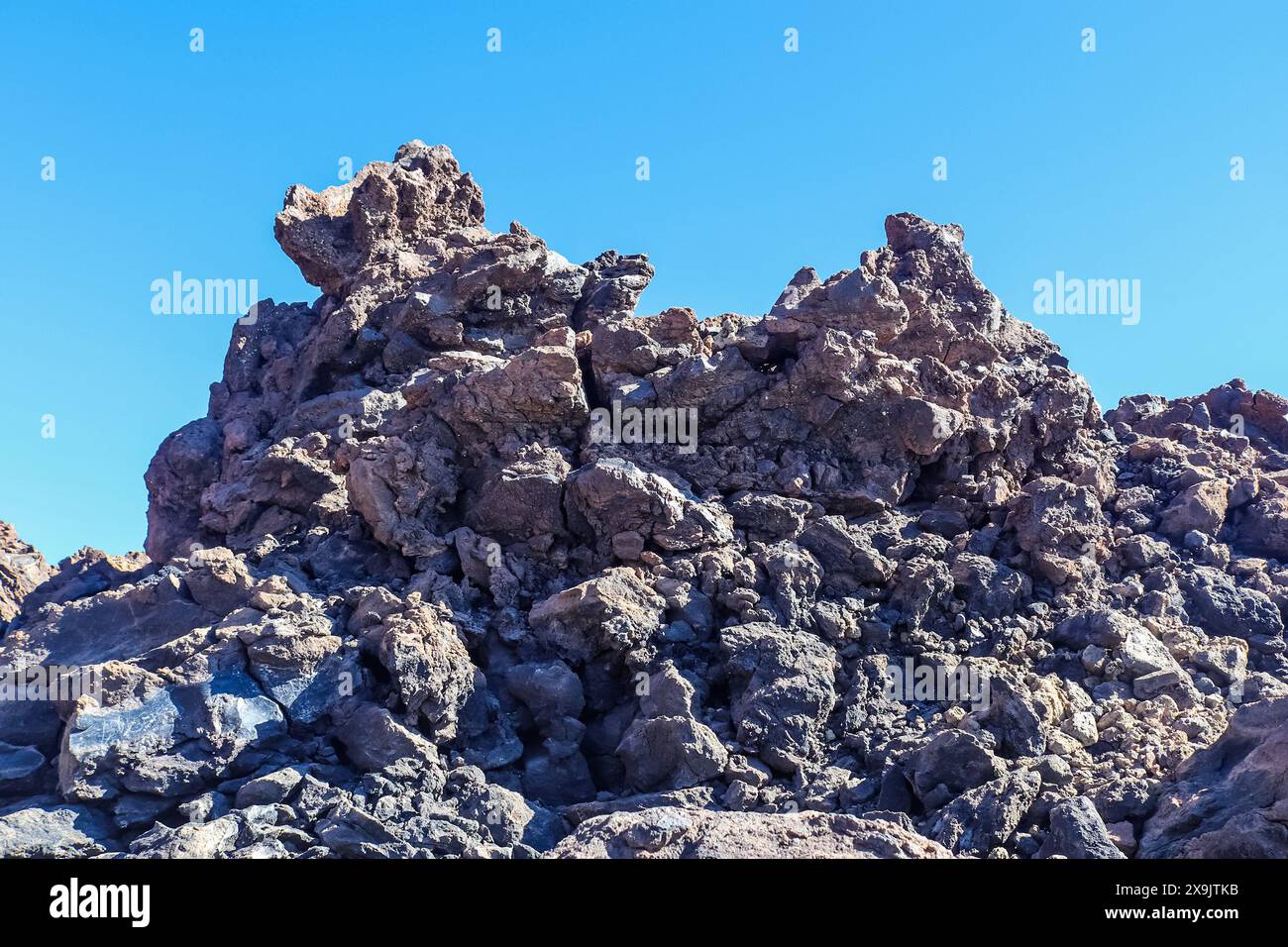 View of the impressive Mount Theide on Tenerife in its rocky ...