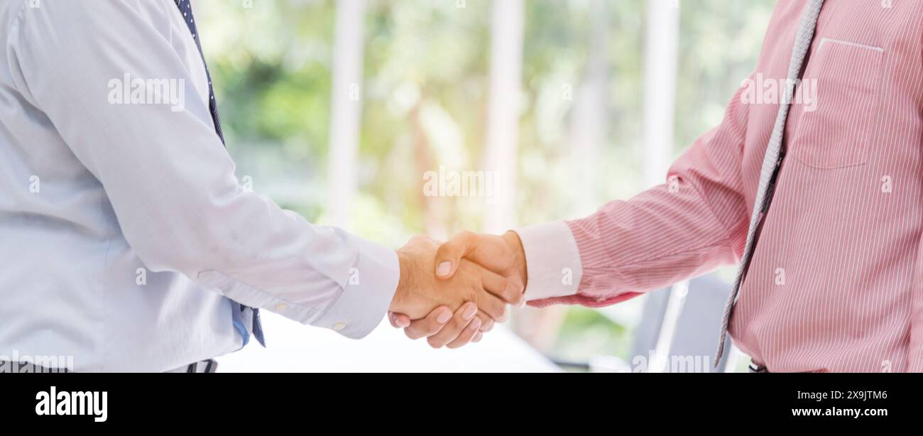 Team Business Partners shaking hands together to Greeting Start up new ...