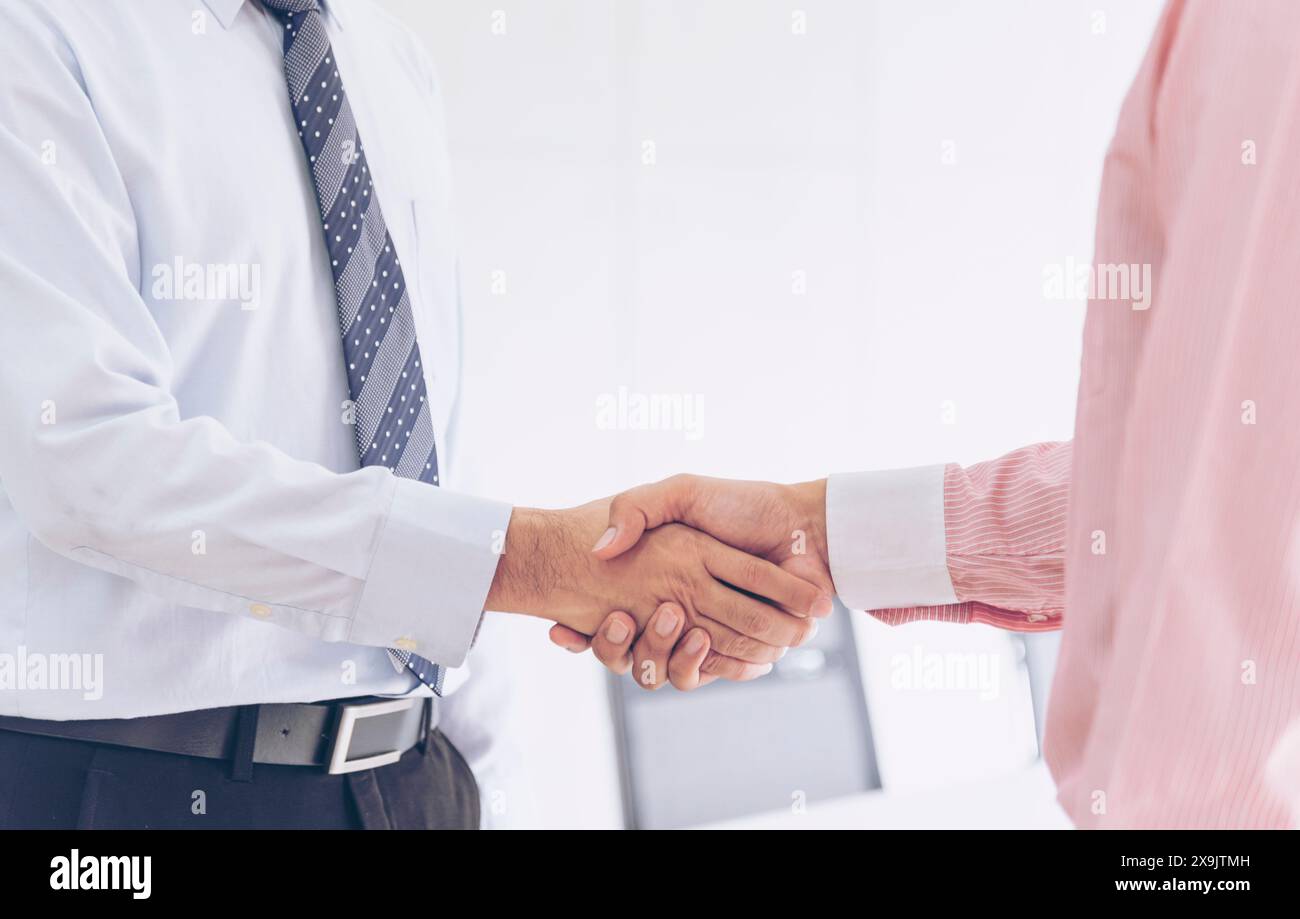 Team Business Partners shaking hands together to Greeting Start up new ...