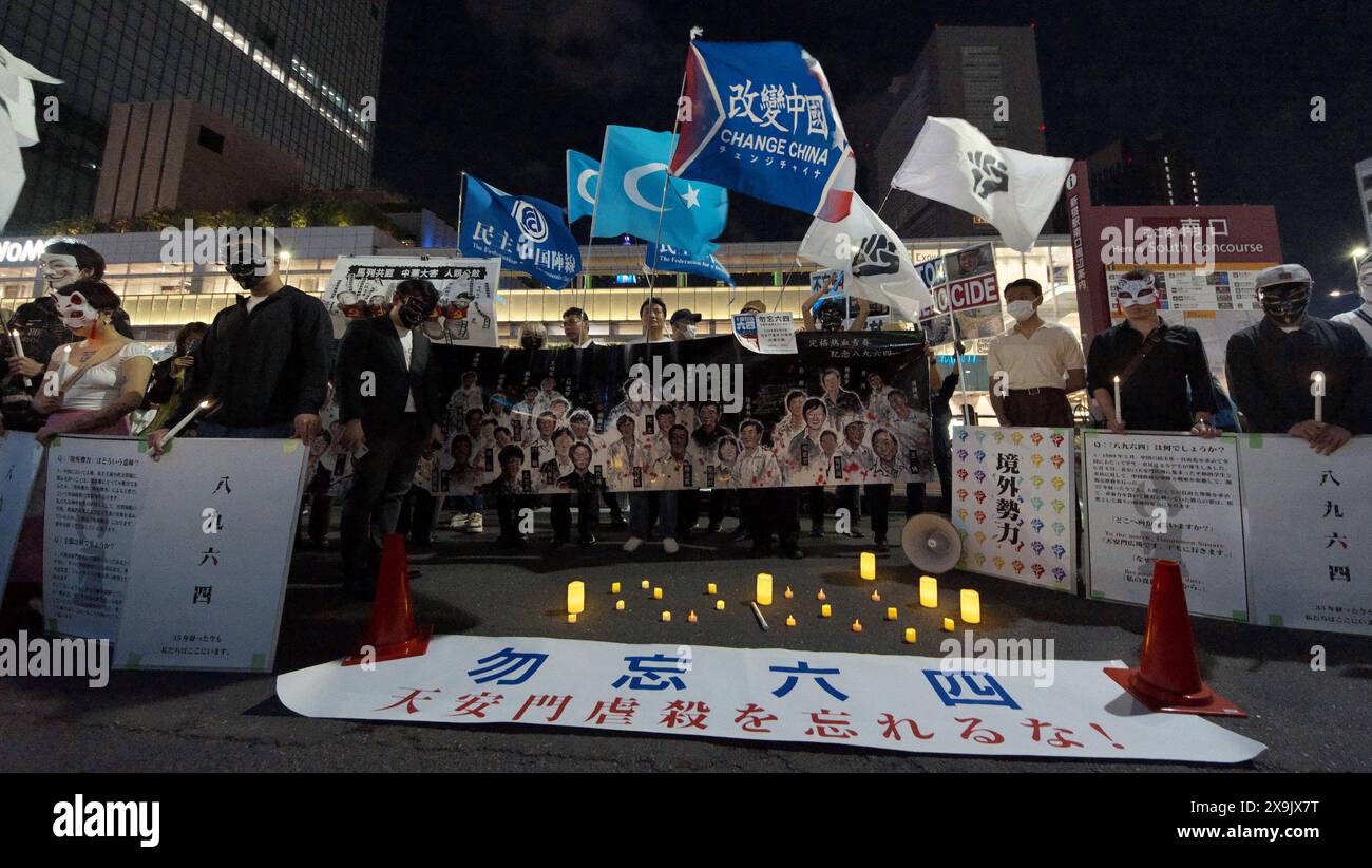 Tokyo, Japan. 1st June, 2024. Protesters pray during a rally to mark ...