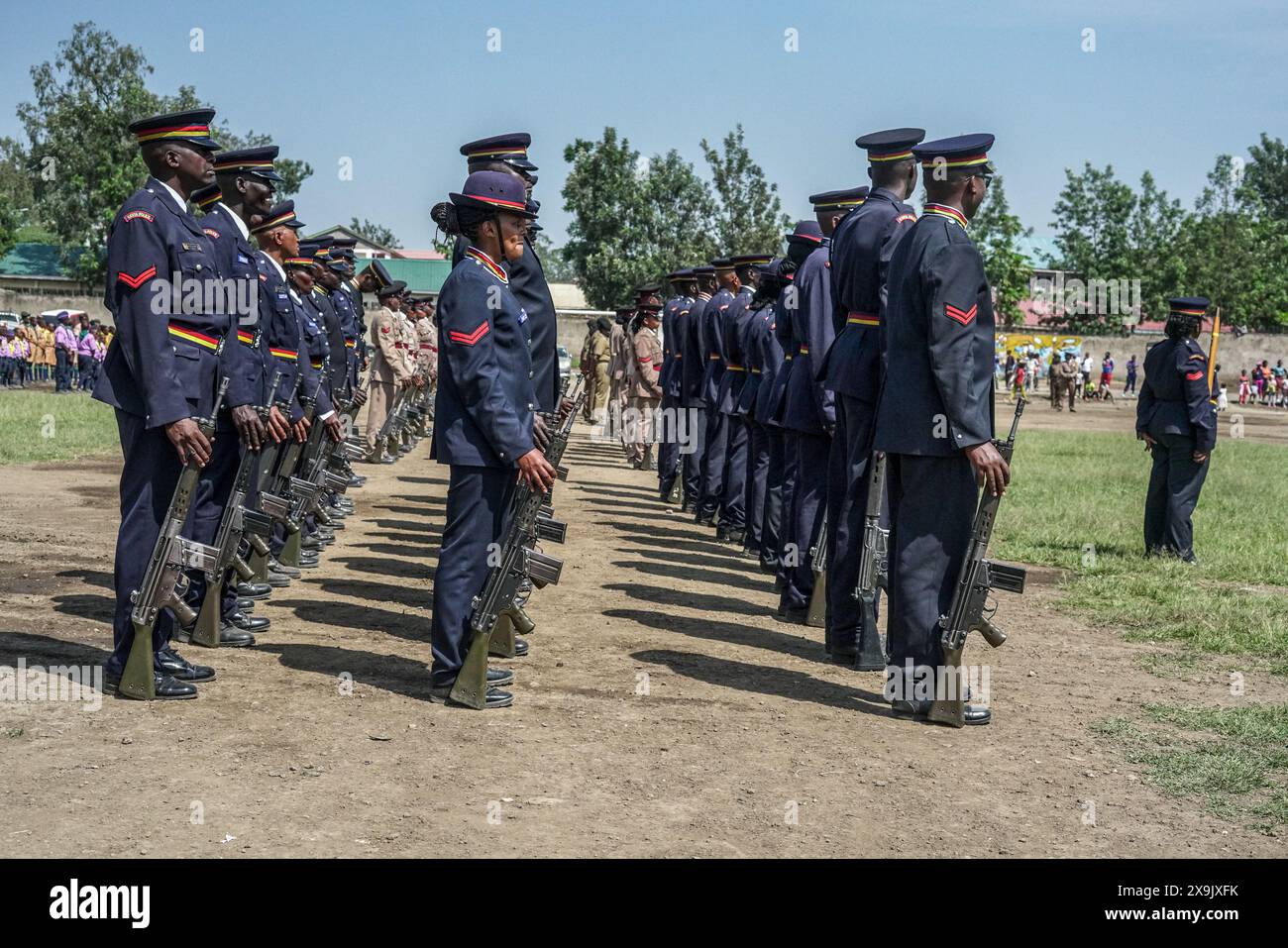 Kenyan police officers wearing ceremonial uniform participate in a ...
