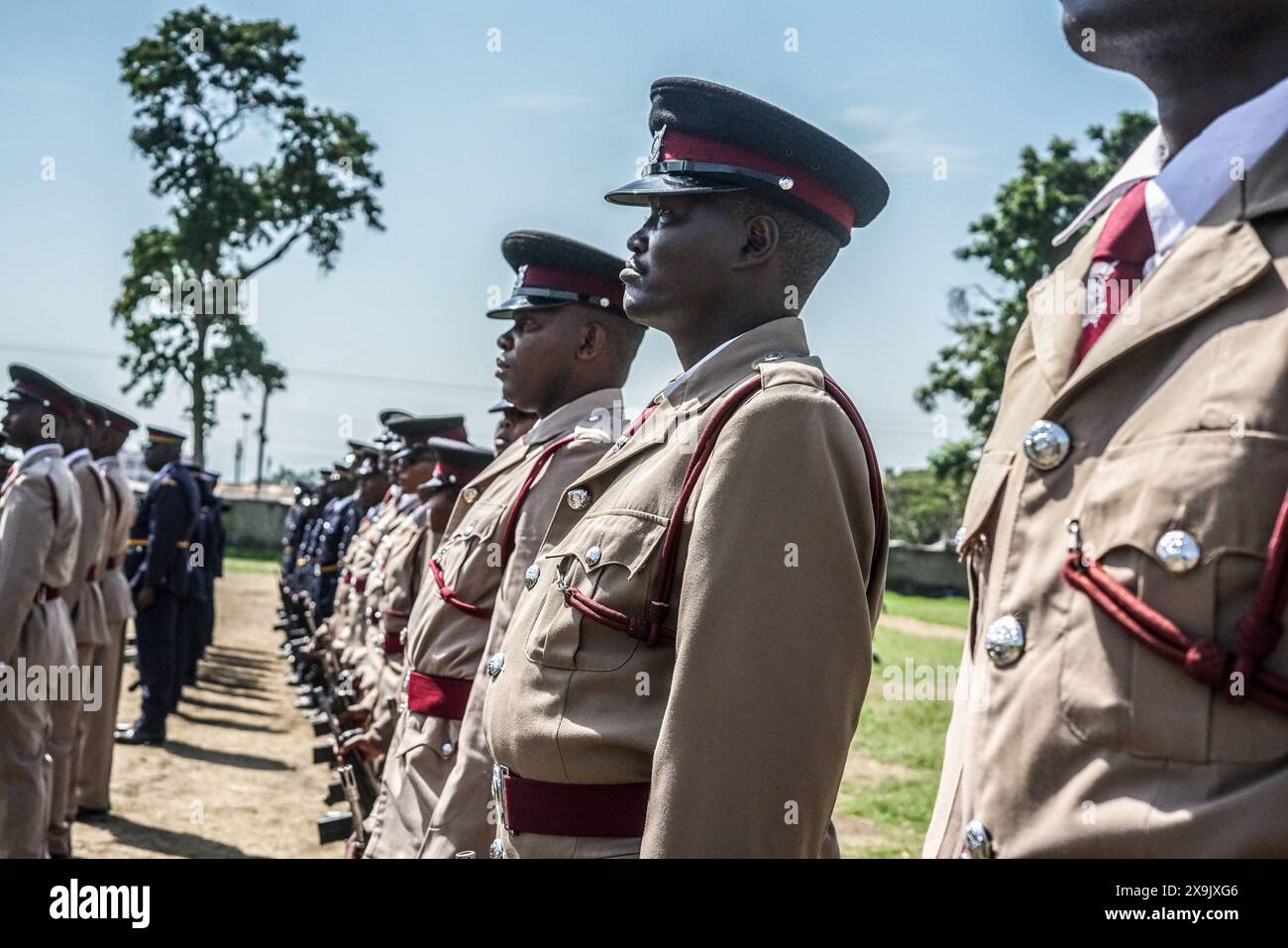 Kenyan police officers wearing ceremonial uniform participate in a ...