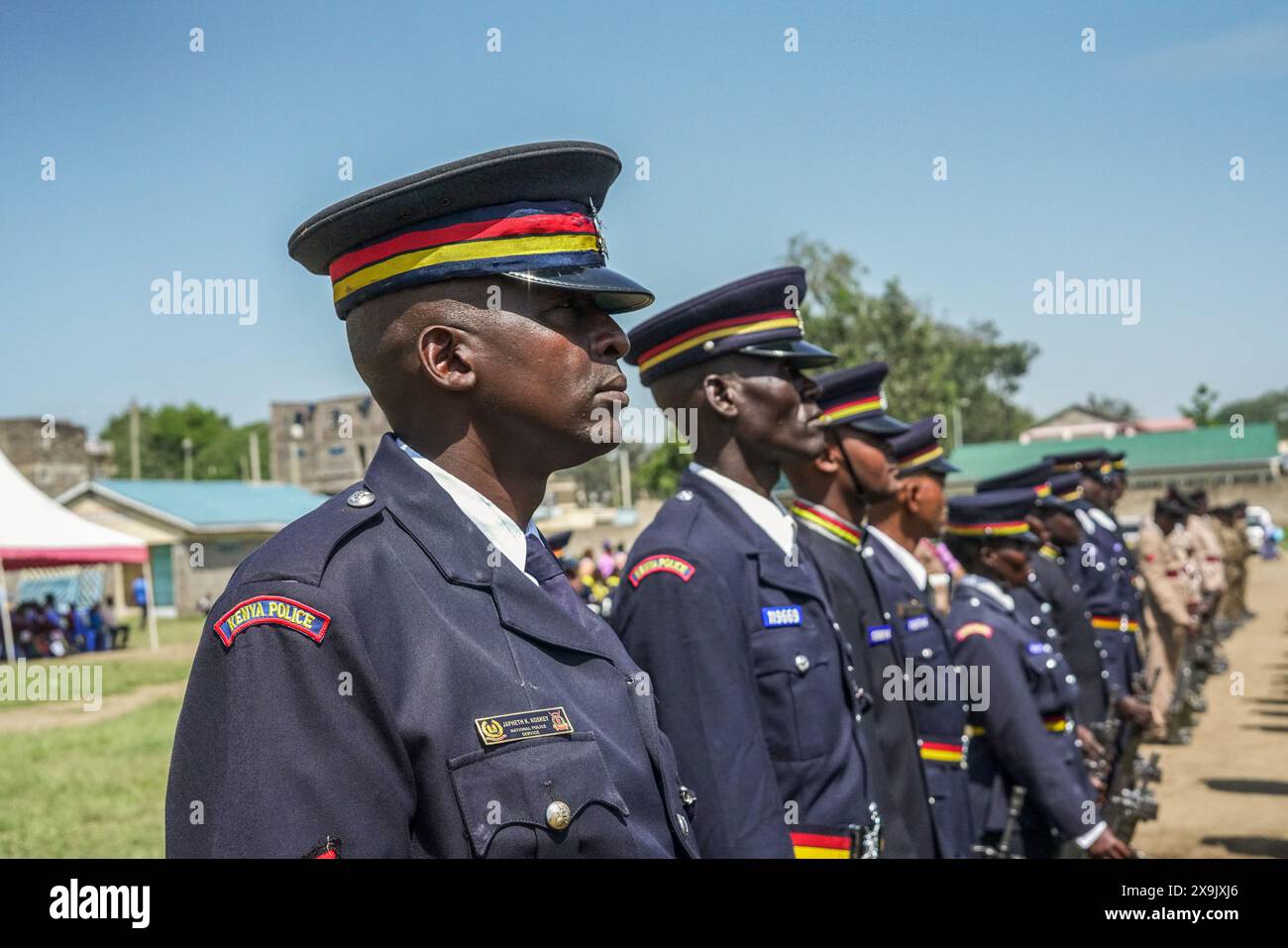 Kenyan police officers wearing ceremonial uniform participate in a ...