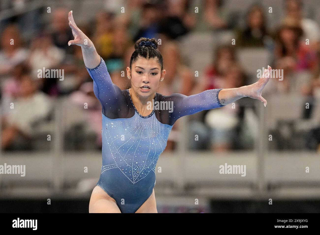 Kayla DiCello competes on the floor during the U.S. Gymnastics ...