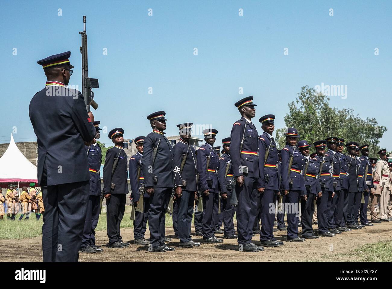 Kenyan police officers wearing ceremonial uniform participate in a ...