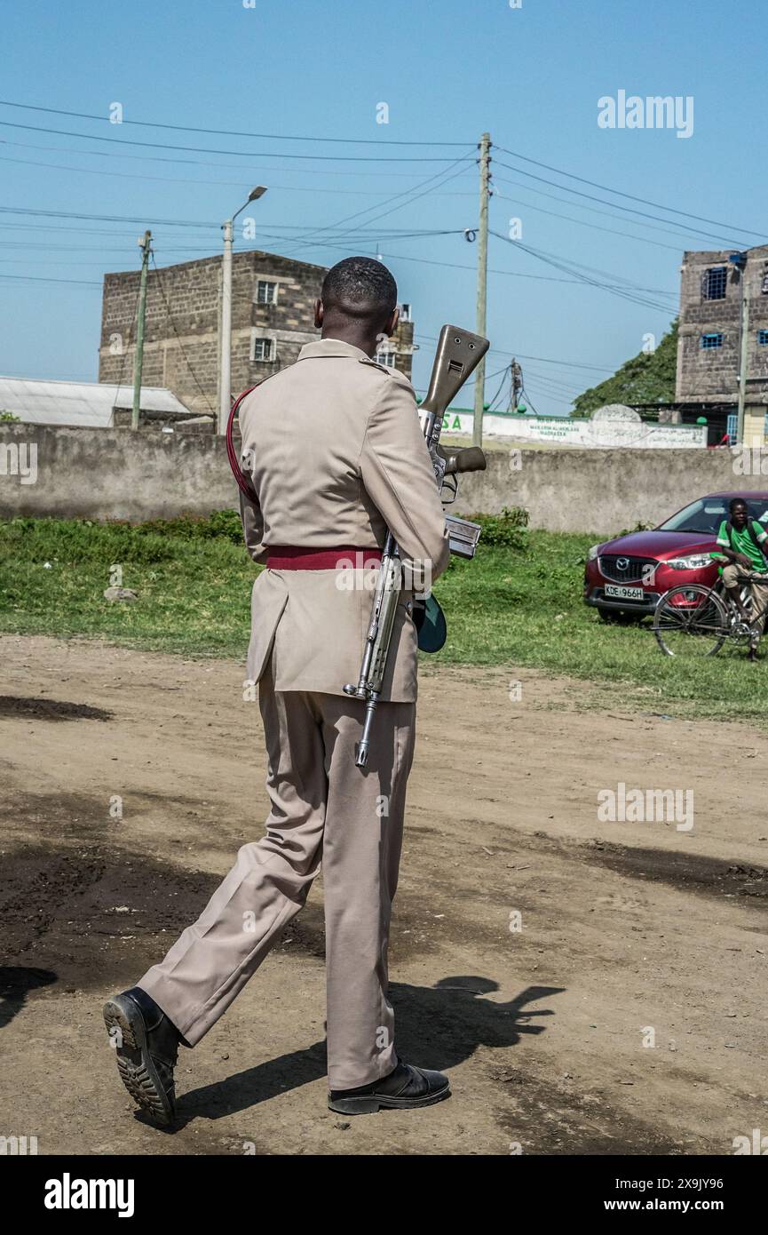 A Kenyan police officer carrying a rifle is seen during the ...