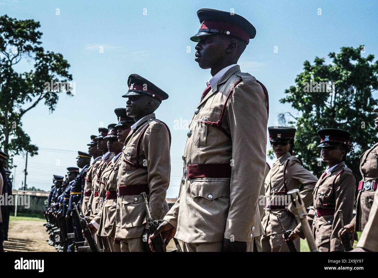 Kenyan police officers wearing ceremonial uniform participate in a ...