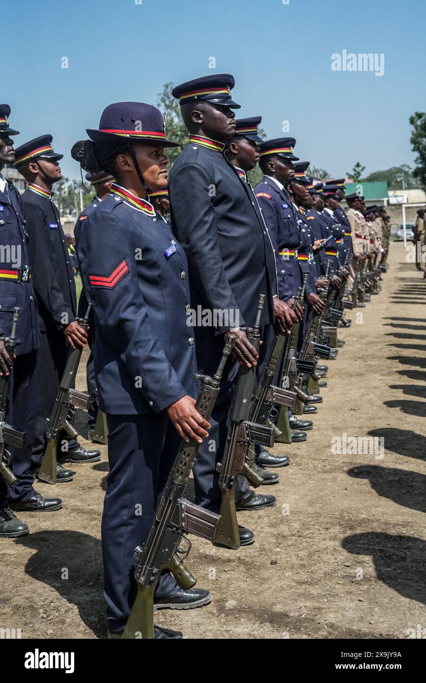 Kenyan police officers wearing ceremonial uniform participate in a ...