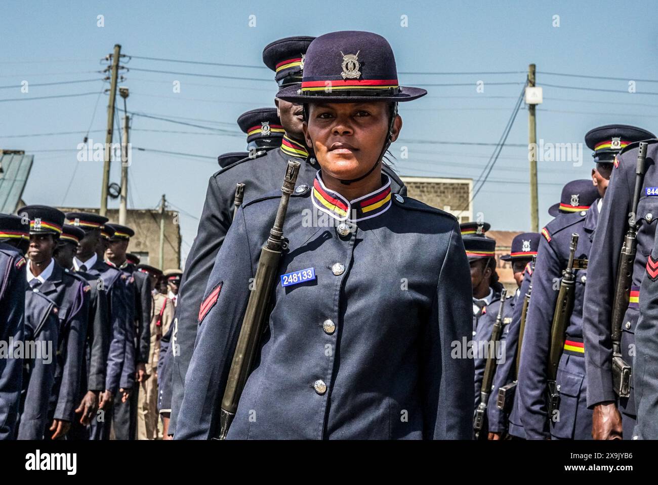 Kenyan police officers wearing ceremonial uniform participate in a ...