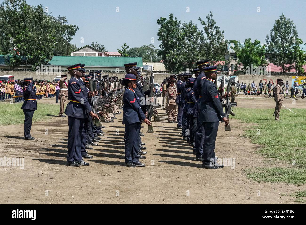 Kenyan police officers wearing ceremonial uniform participate in a ...