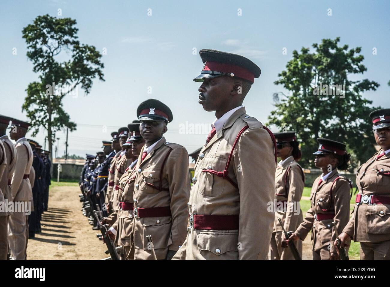 Kenyan police officers wearing ceremonial uniform participate in a ...