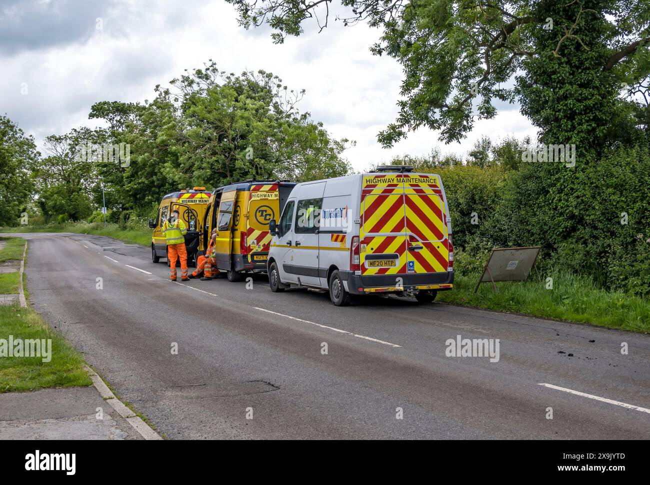 Three highway maintenance vans parked on Fiskerton road, Cherry ...