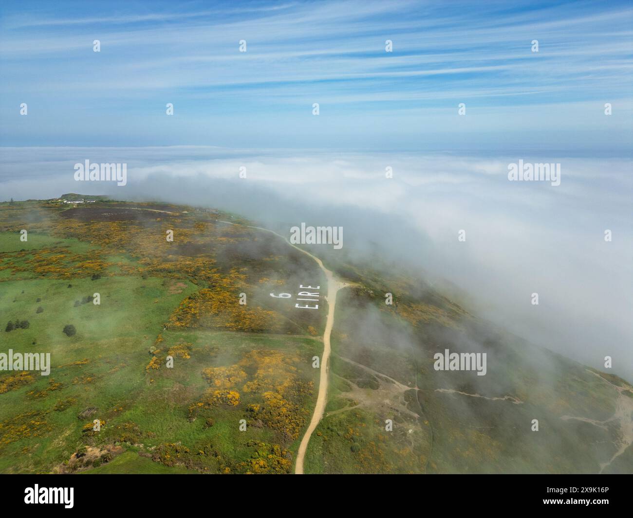 Sea fog covering Dublin Bay from Howth facing towards the Eire 6 sign ...