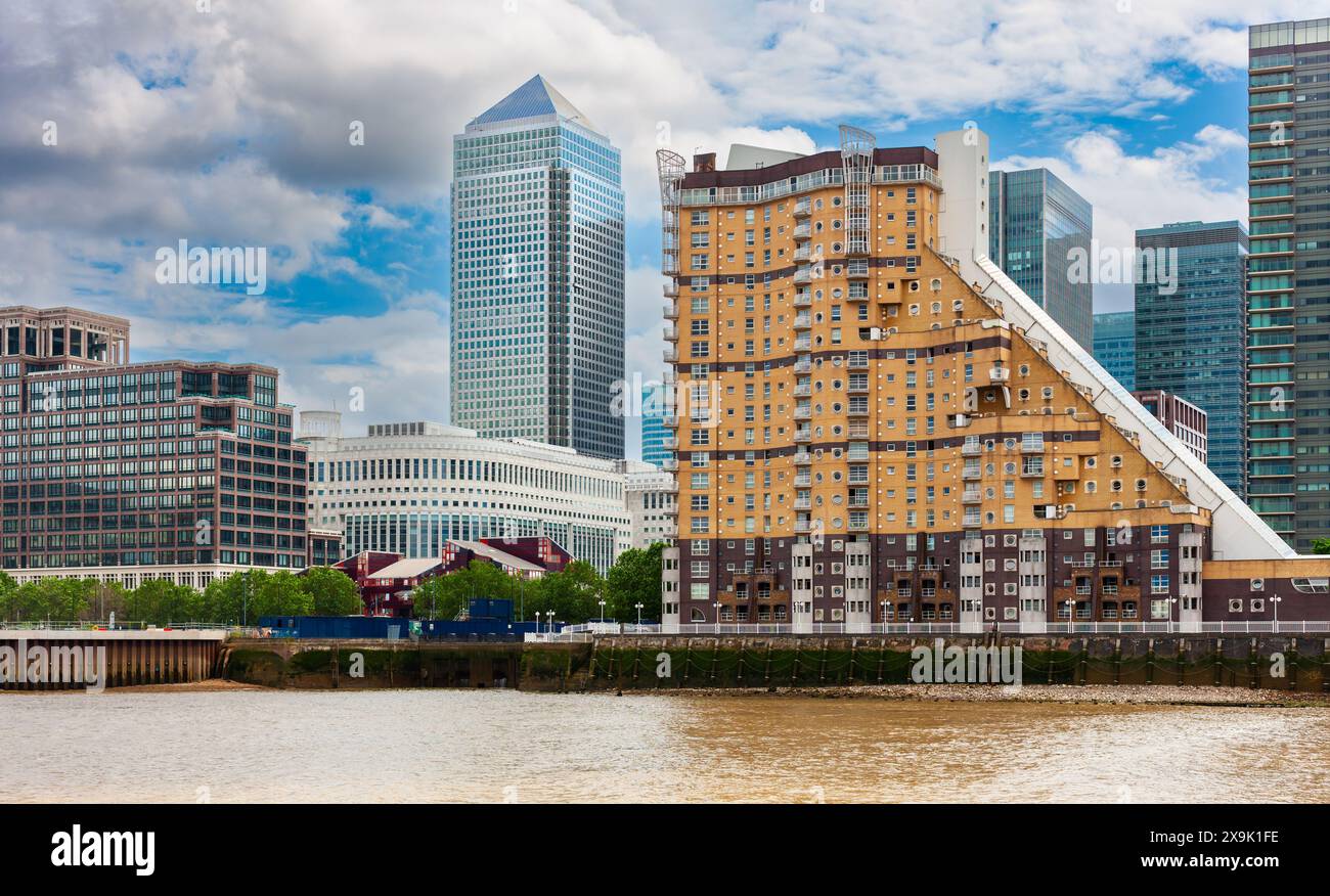 Tall, narrow, trapezoid shaped apartment building on River Thames ...