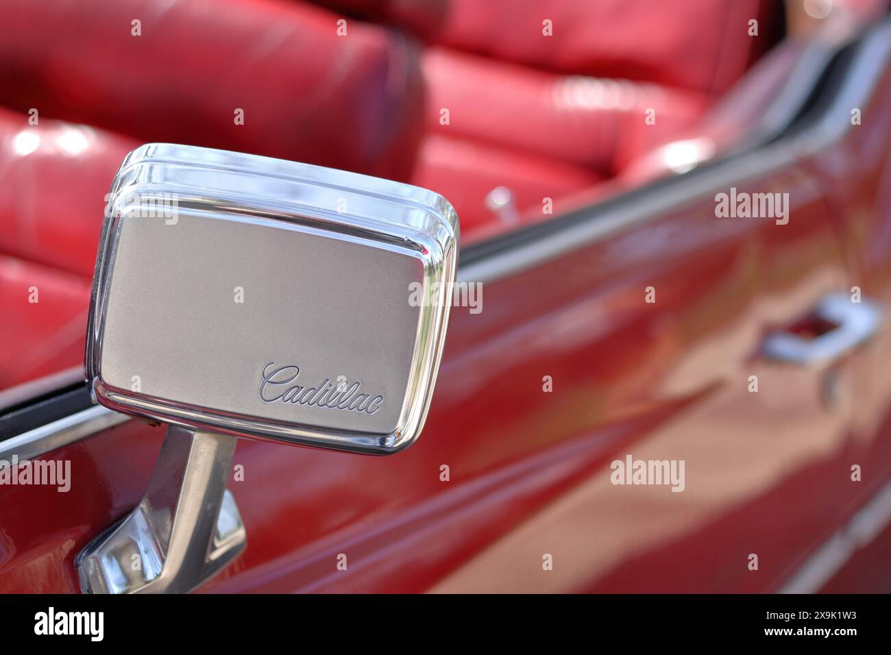 A mirror of red classic Cadillac Stock Photo - Alamy