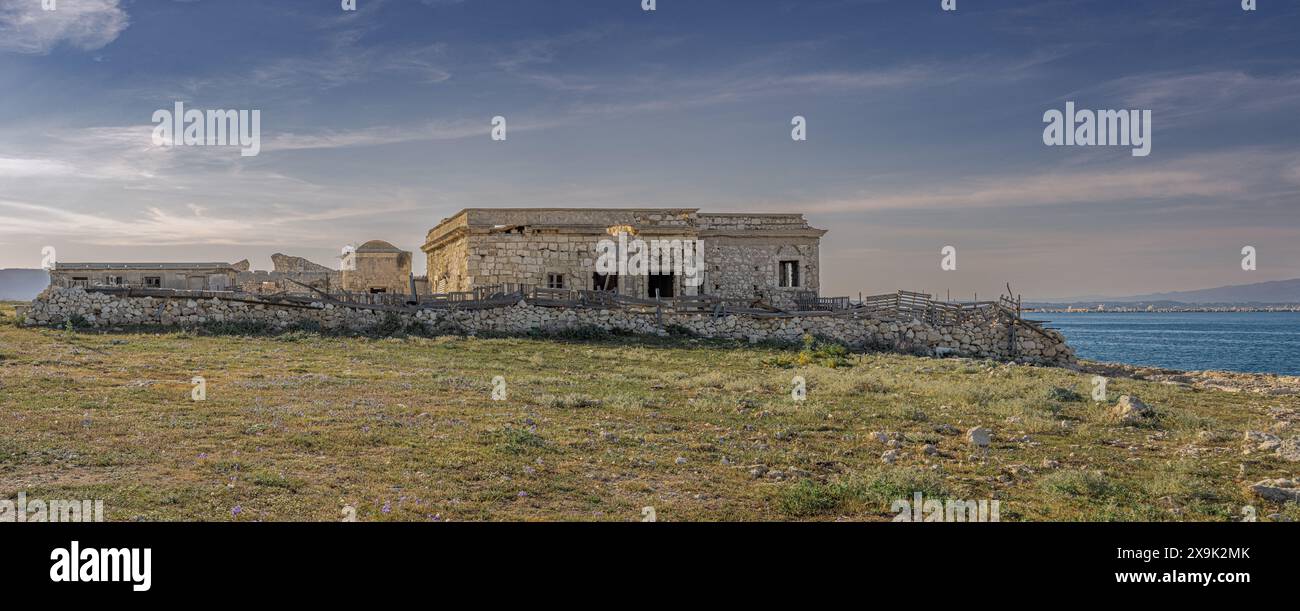 Old abandoned house and sheep farm facing the gulf of Augusta; Priolo ...