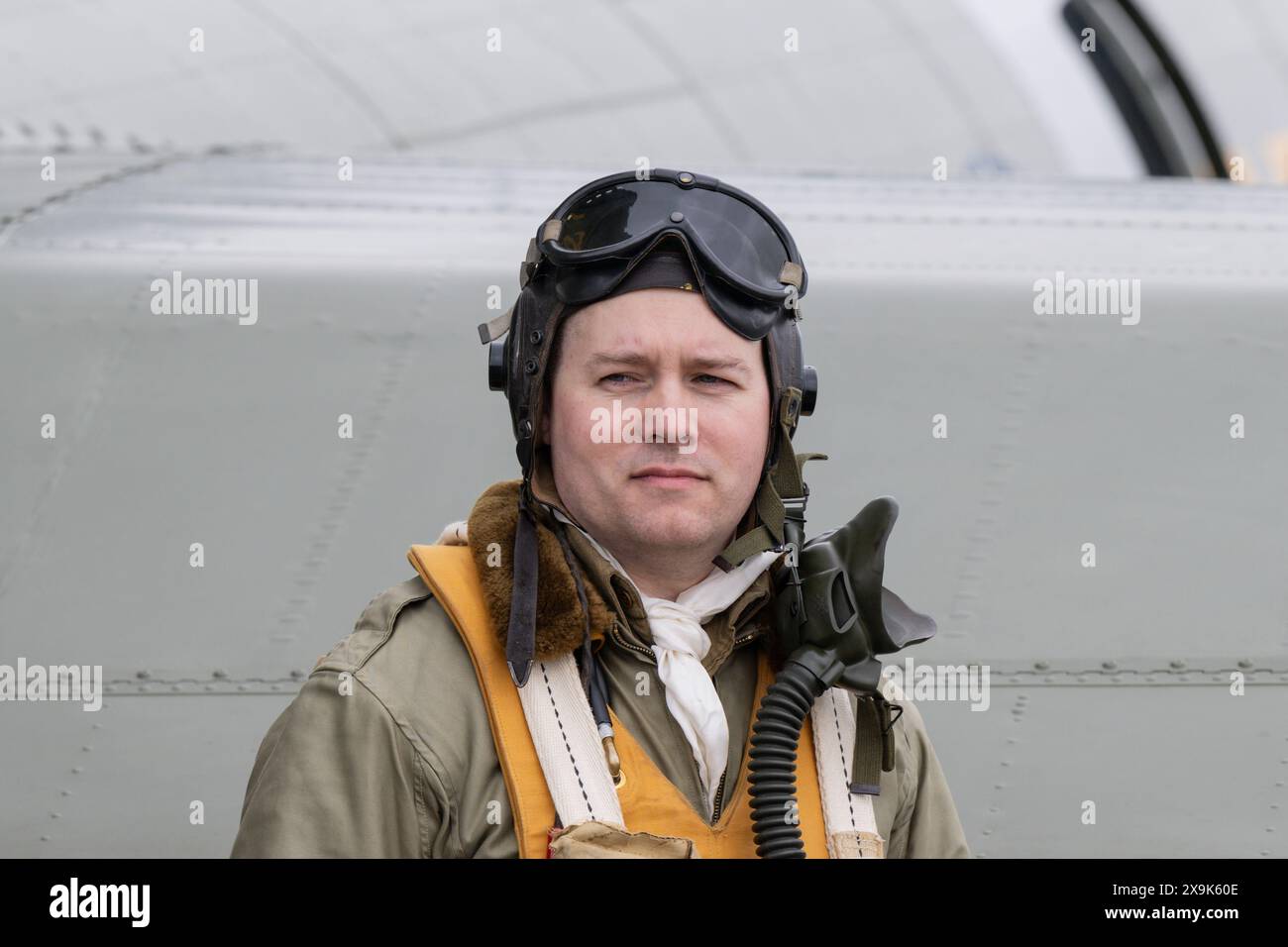 A reenactor poses in front of Boeing B-17G Flying Fortress 'Sally B ...