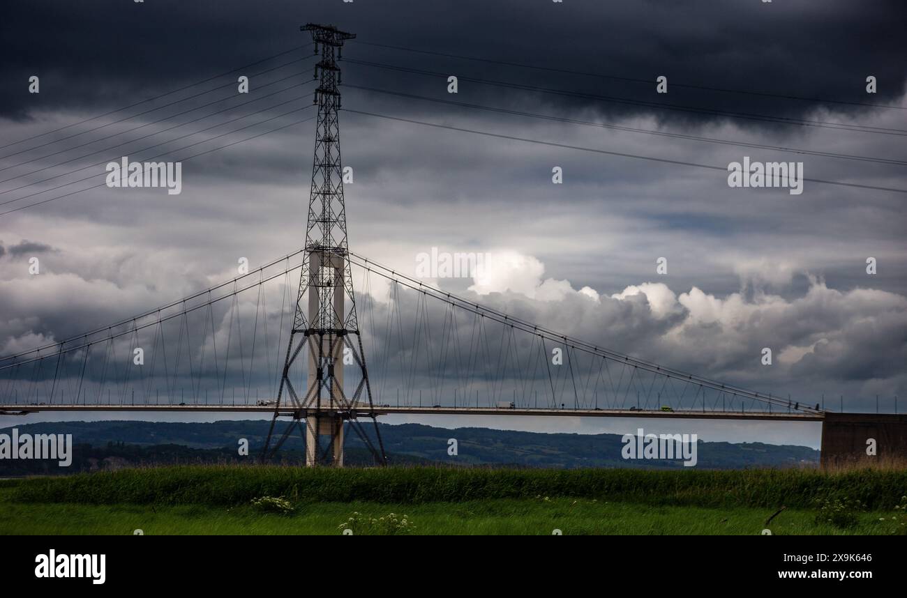 Large electrical pylon clouds in hi-res stock photography and images ...