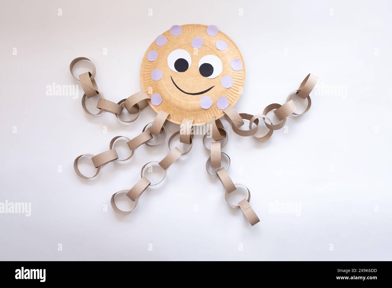 Craft project creating an octopus with simple materials: disposable ...
