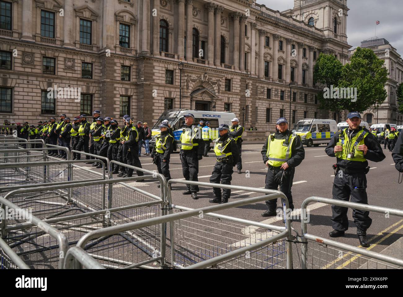 London, UK. 1 June 2024. Police set up barriers in Whitehall during a ...