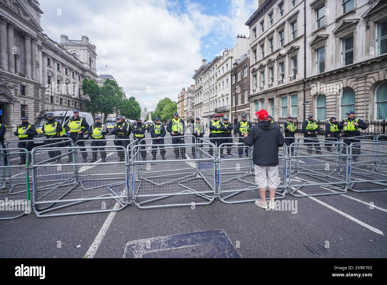 London, UK. 1 June 2024. Police set up barriers in Whitehall during a ...
