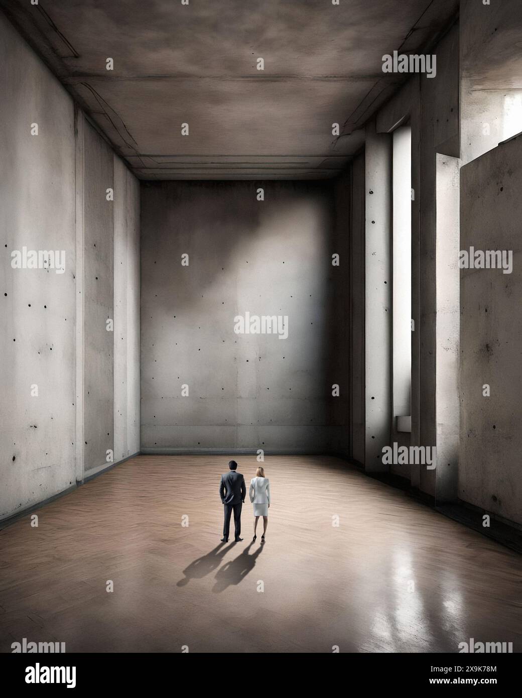 man and woman in suit, inside a huge empty room of concrete walls Stock ...