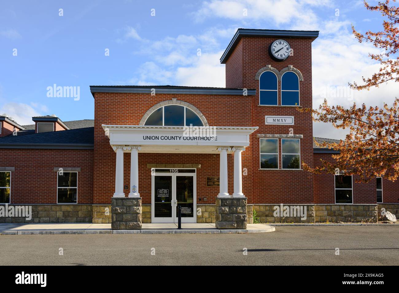 La Grande, OR, USA - April 27, 2024; Sign and clock on Union County ...