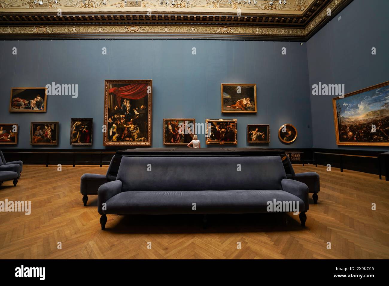 Vienna art history museum interior, known as Kunsthistorisches Museum Wien or KHM. Woman in art ...