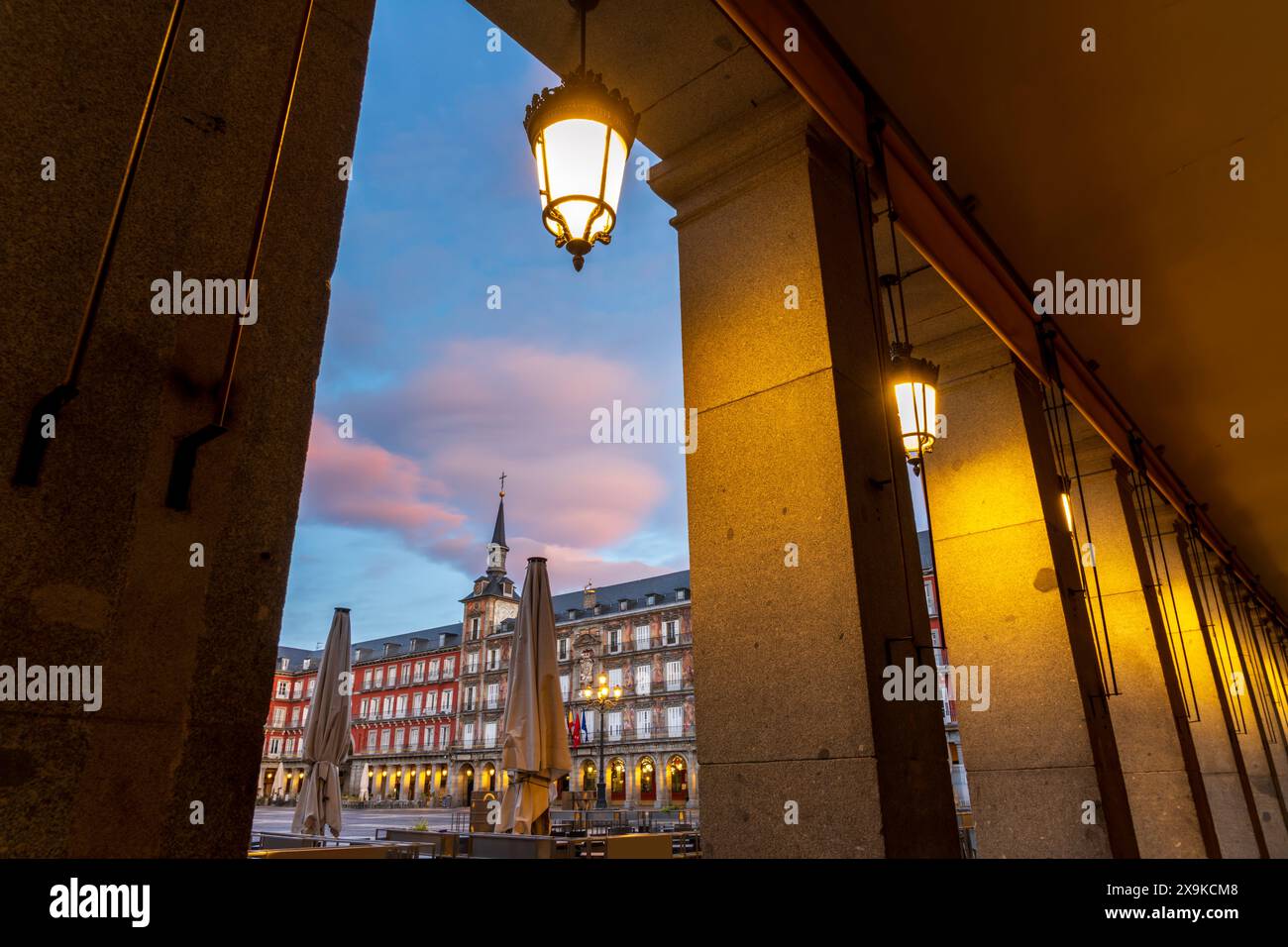 Madrid Plaza Mayor, main square at sunrise in Spain. Madrid city skyline of town square with ...