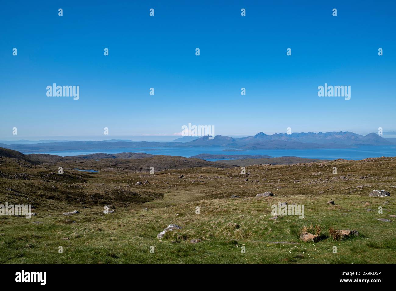 Driving across the Applecross pass on North Coast 500 route with view ...