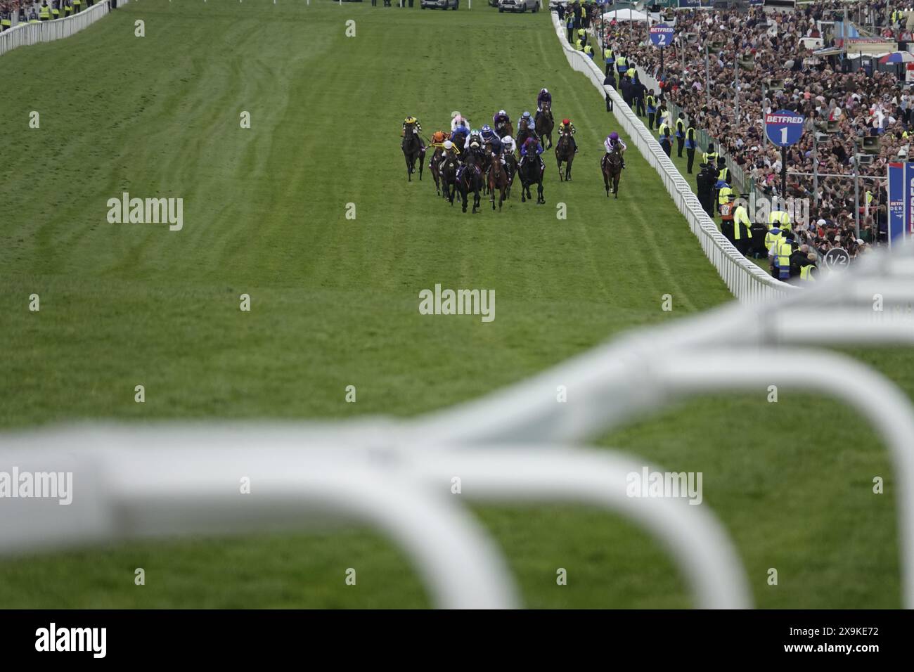Epsom, Surrey, UK. 1st June, 2024. The full field - minus one jockey, P ...