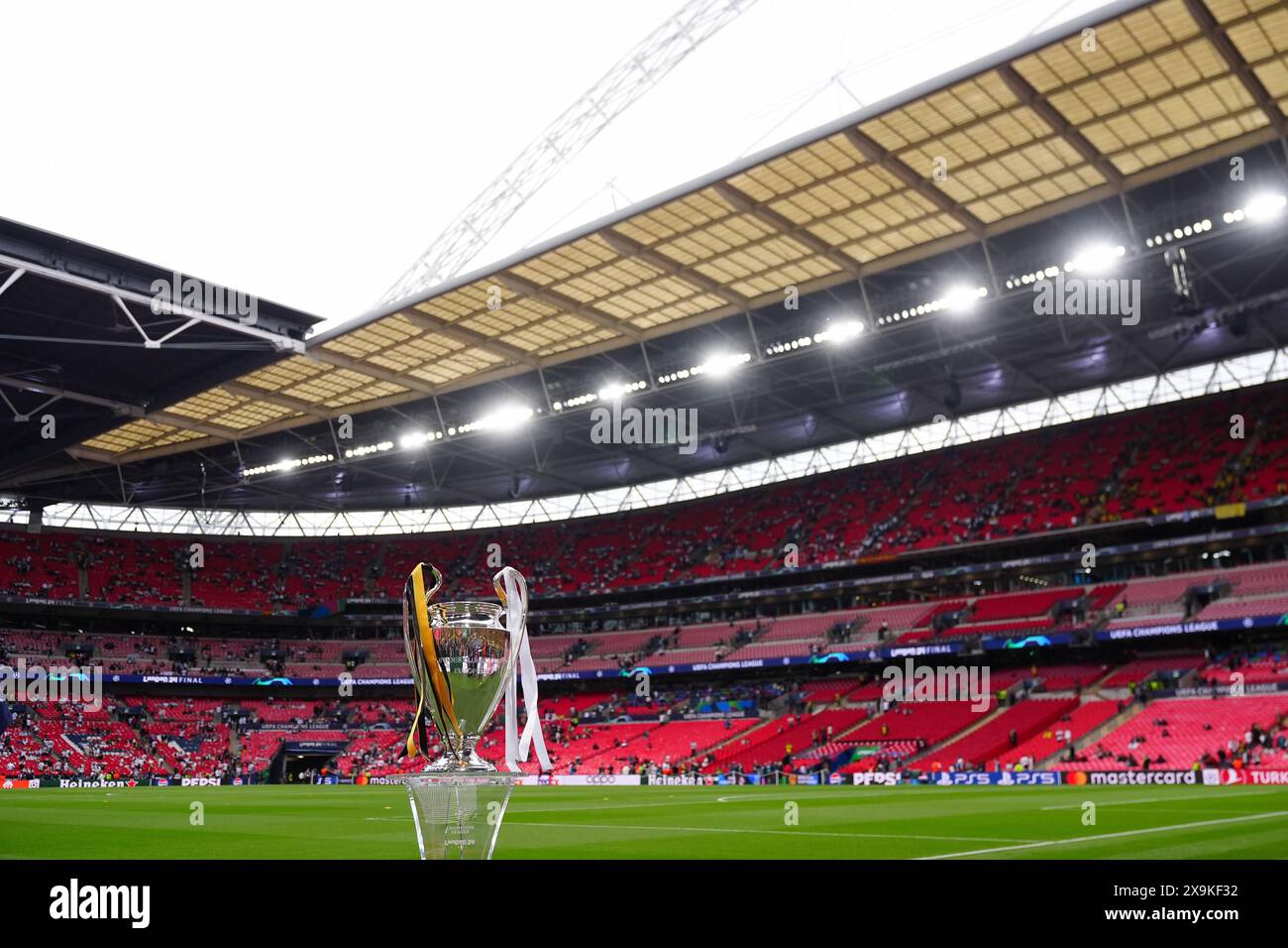The UEFA Champions League trophy on display inside Wembley Stadium ...