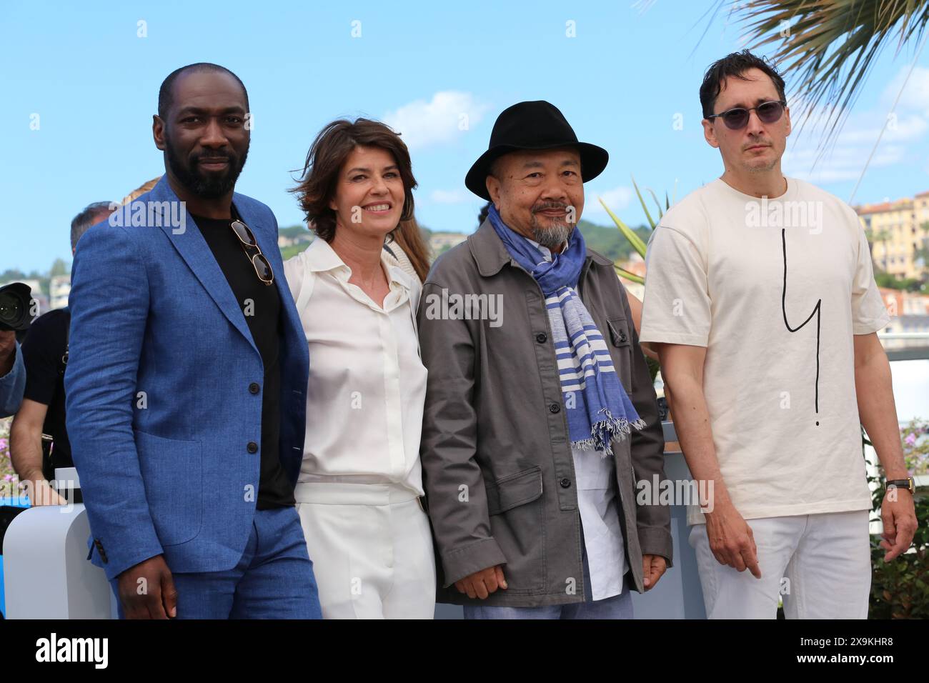 Cannes, France. 17th May, 2024. Cyril Guéï, Irène Jacob, Director Rithy Panh and Grégoire Colin ...