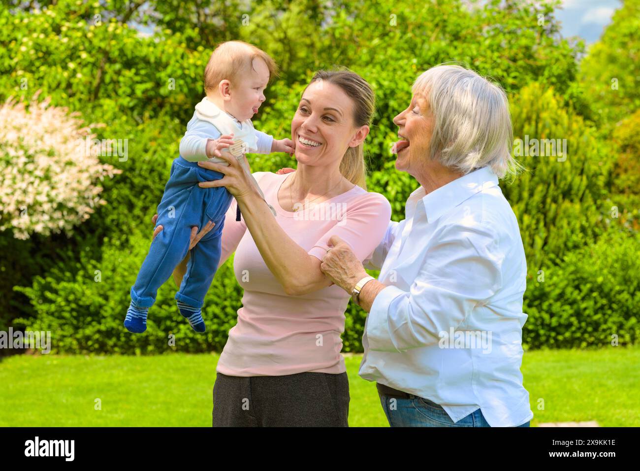 A heartwarming image of three generations sharing a joyful moment in a ...