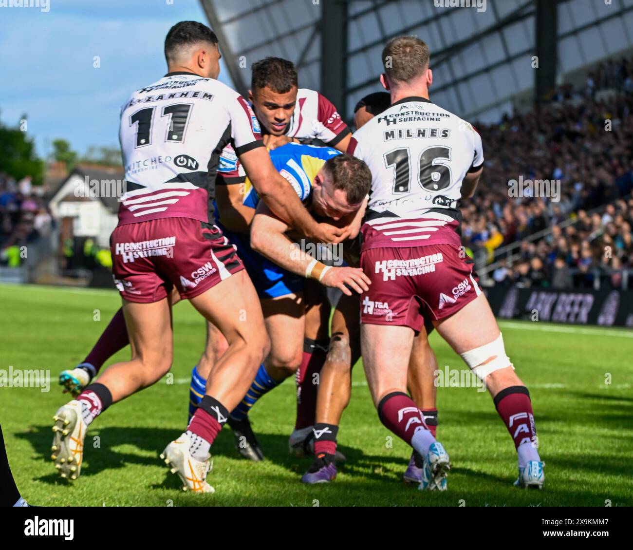 Cameron Smith of Leeds Rhinos is held up before the line during the ...