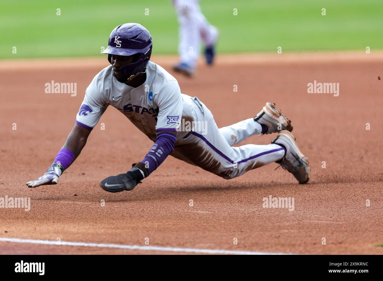June 1, 2024: Kaelen Culpepper #22 of Kansas State begins his face firs ...