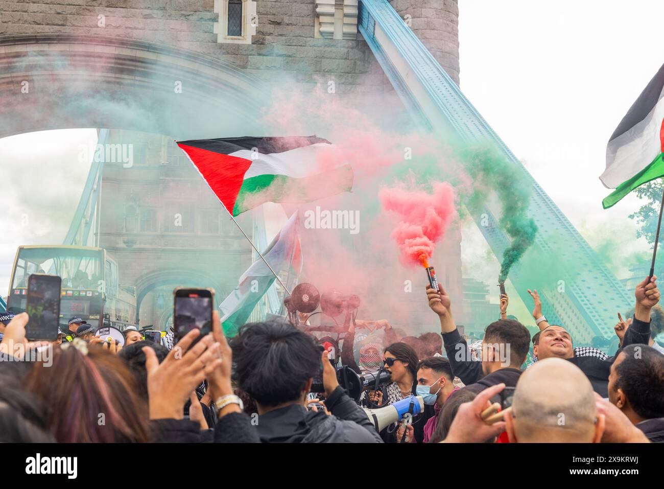 London, UK. 01 JUN, 2024. Pro Palestine protestors gather with smoke ...