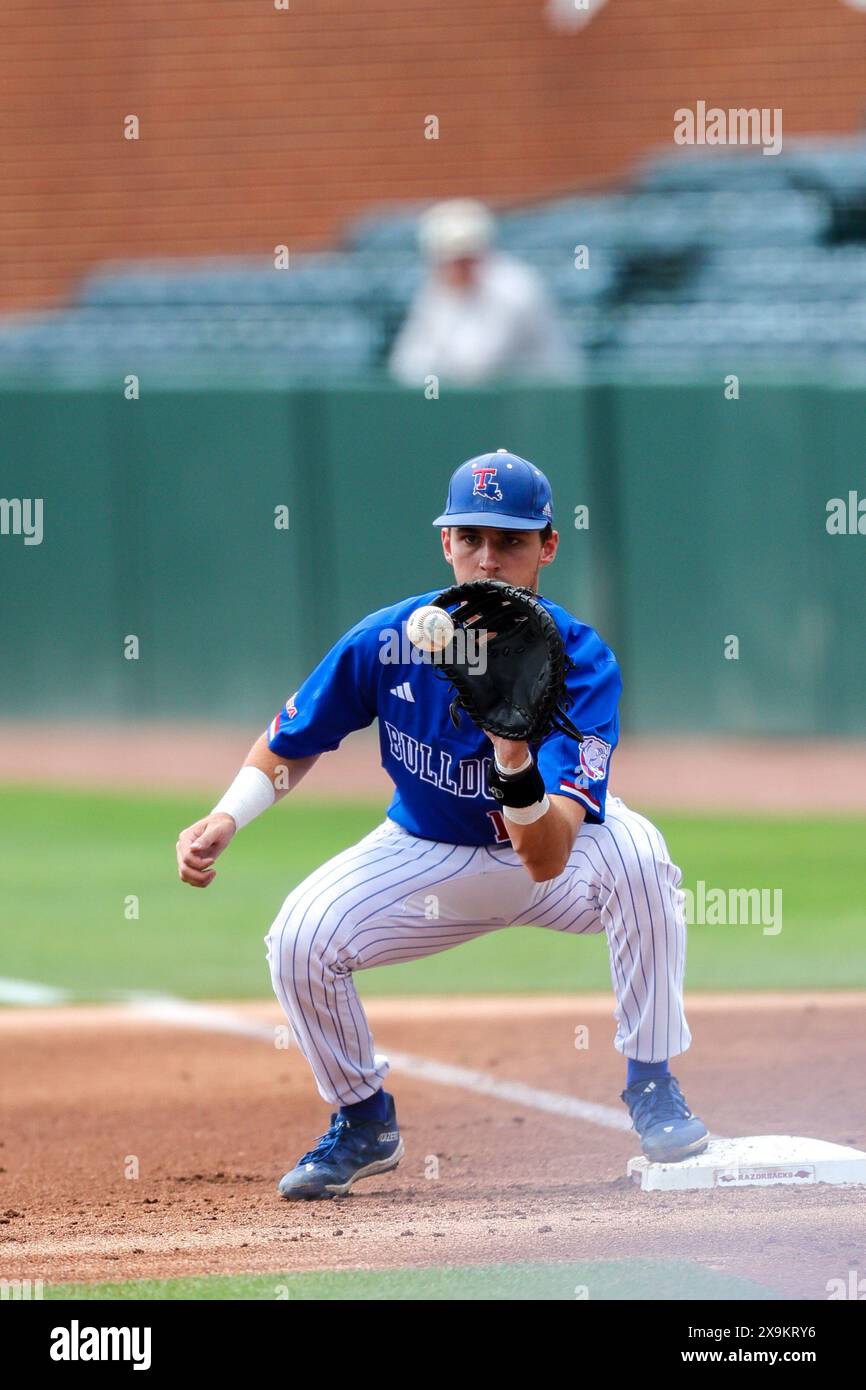 June 1, 2024: Louisiana Tech infielder Grant Comeaux #14 goes down to ...