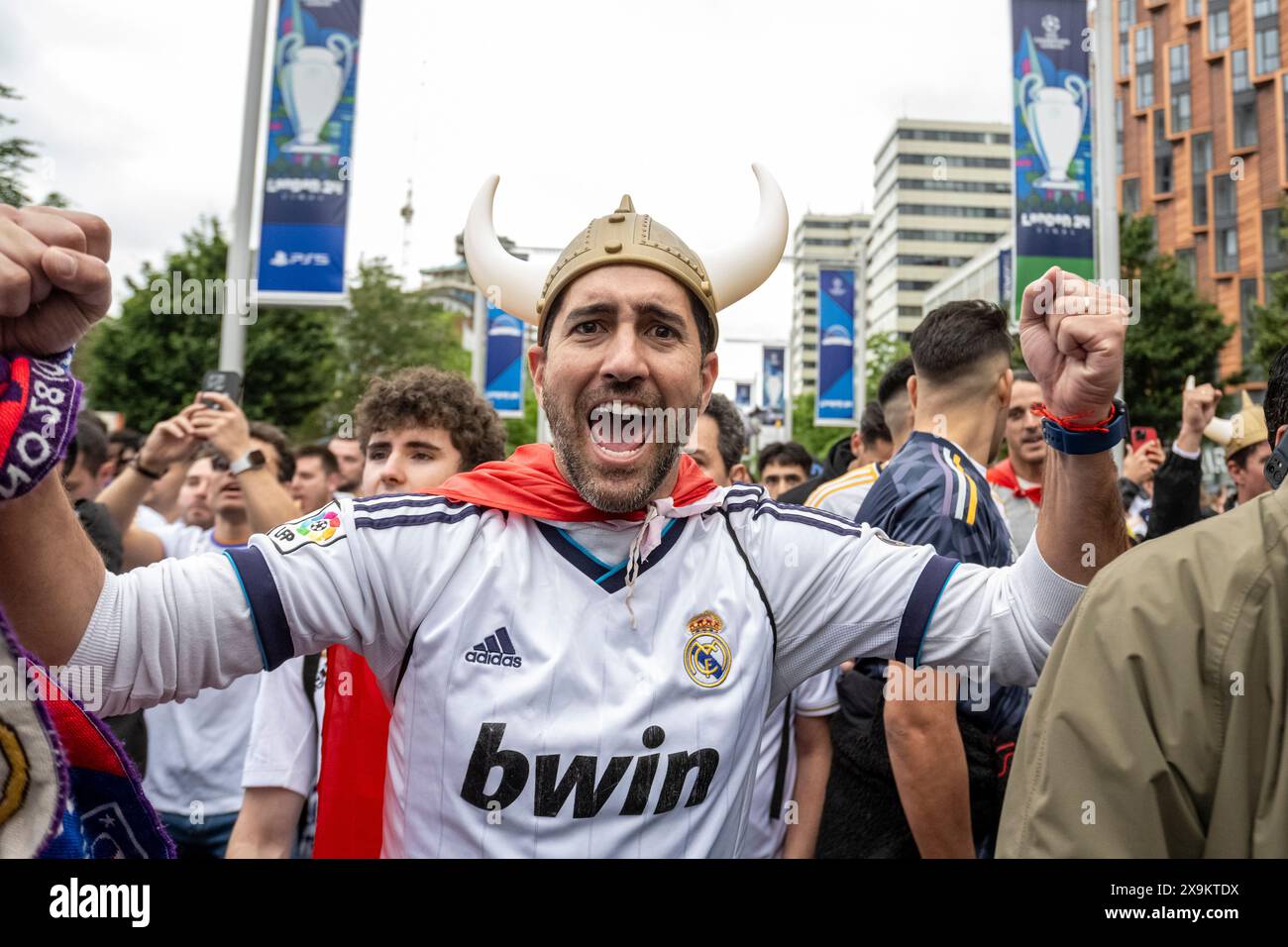 London, UK. 1 June 2024. Real Madrid fans arrive in Olympic Way ahead ...