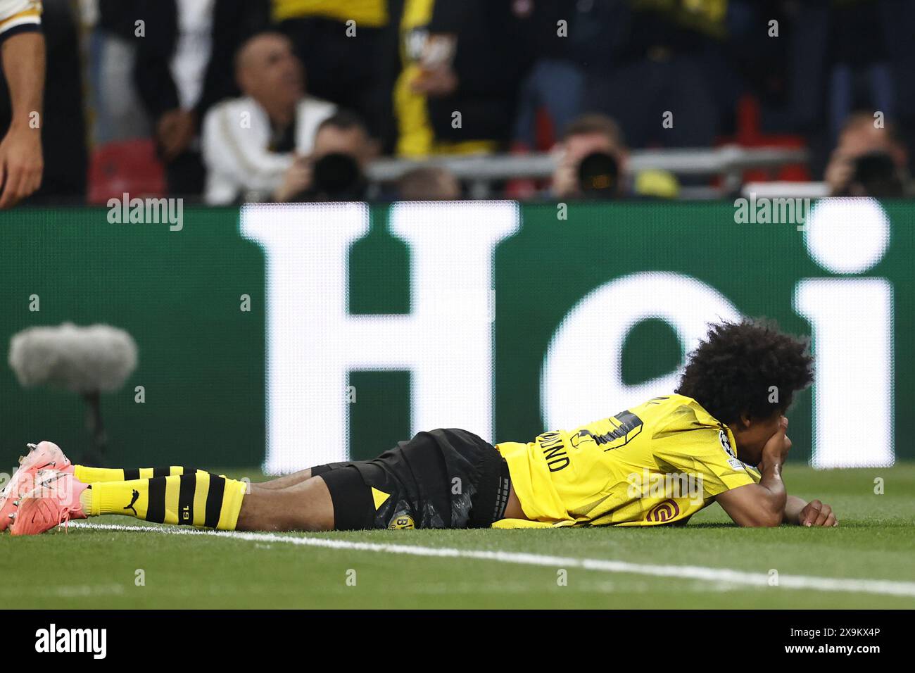 LONDON - Karim Adeyem of Borussia Dortmund is disappointed during the ...