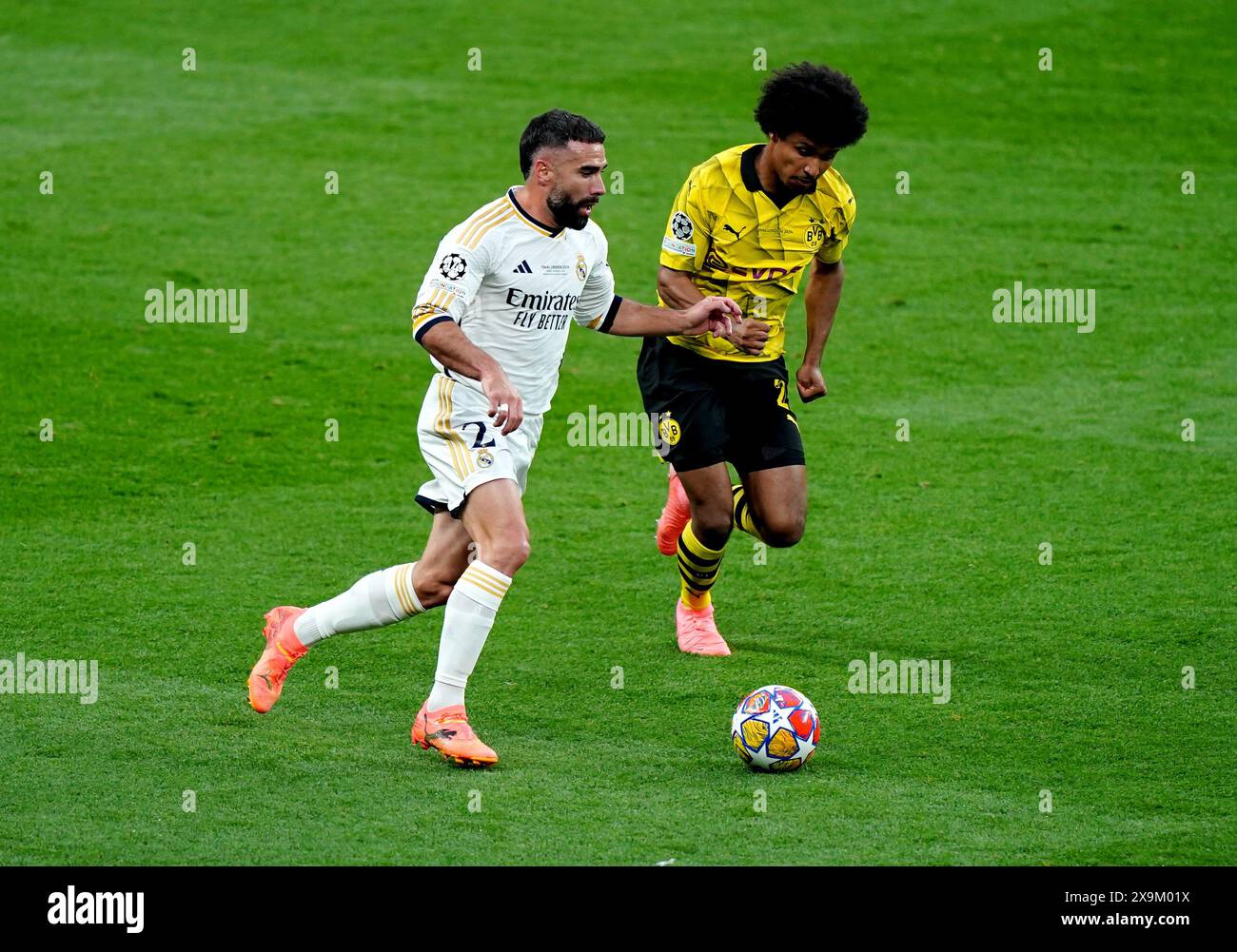 Real Madrid's Daniel Carvajal (left) and Borussia Dortmund's Karim ...