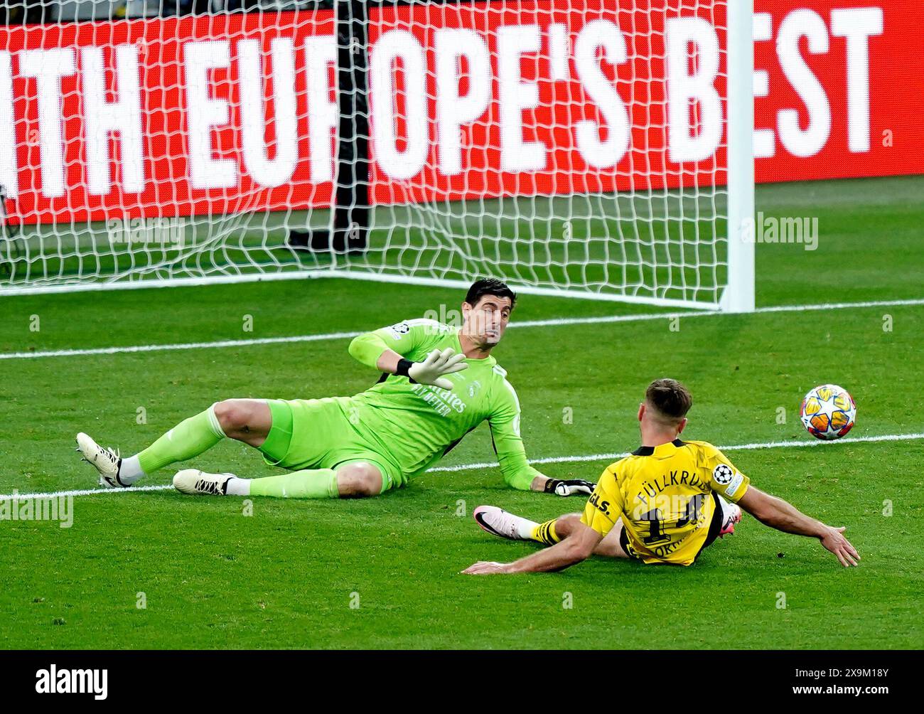 Borussia Dortmund's Niclas Fullkrug sees his shot go wide and hit the ...