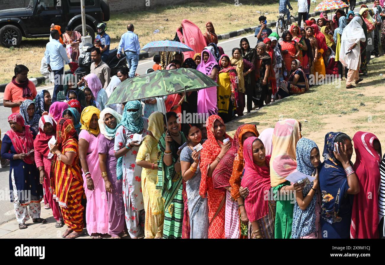 CHANDIGARH, INDIA - JUNE 1: Residents in a long queue during the voting ...