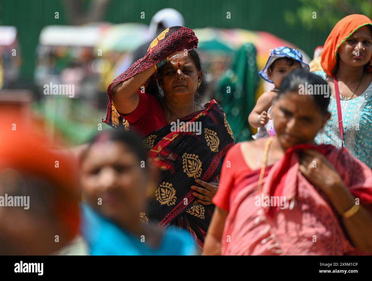 NEW DELHI, INDIA - JUNE 1: People seen out amid hot weather at Munirka ...